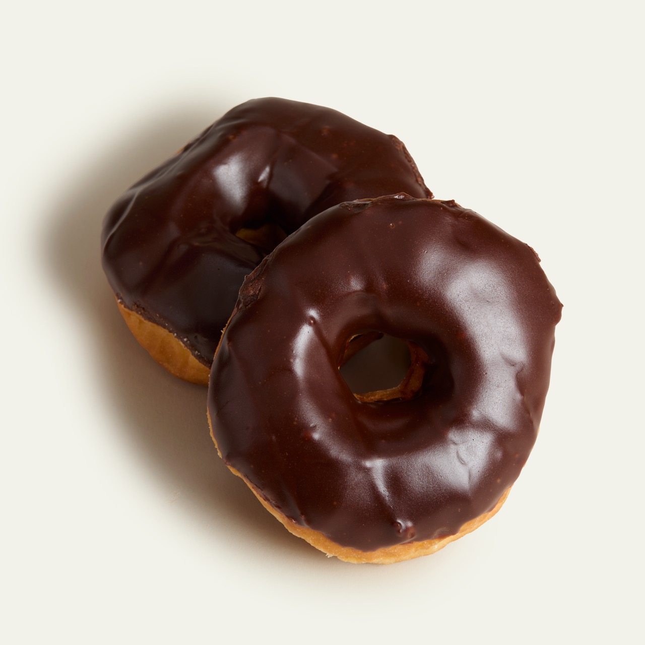 Raised Chocolate Iced Donut – Coeur d’ Alene Baking Company