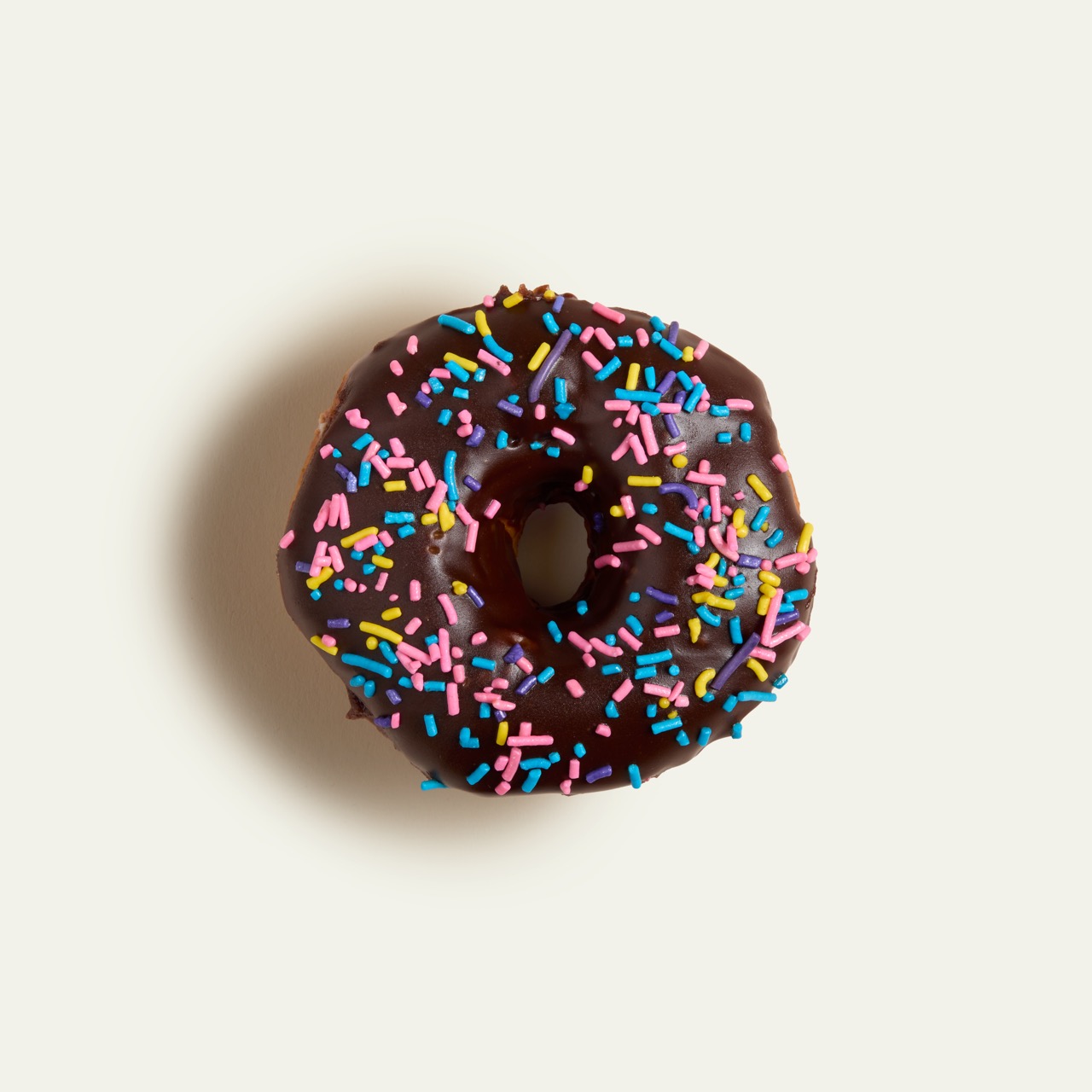Raised Chocolate Ring Donut with Sprinkles – Coeur d’ Alene Baking Company