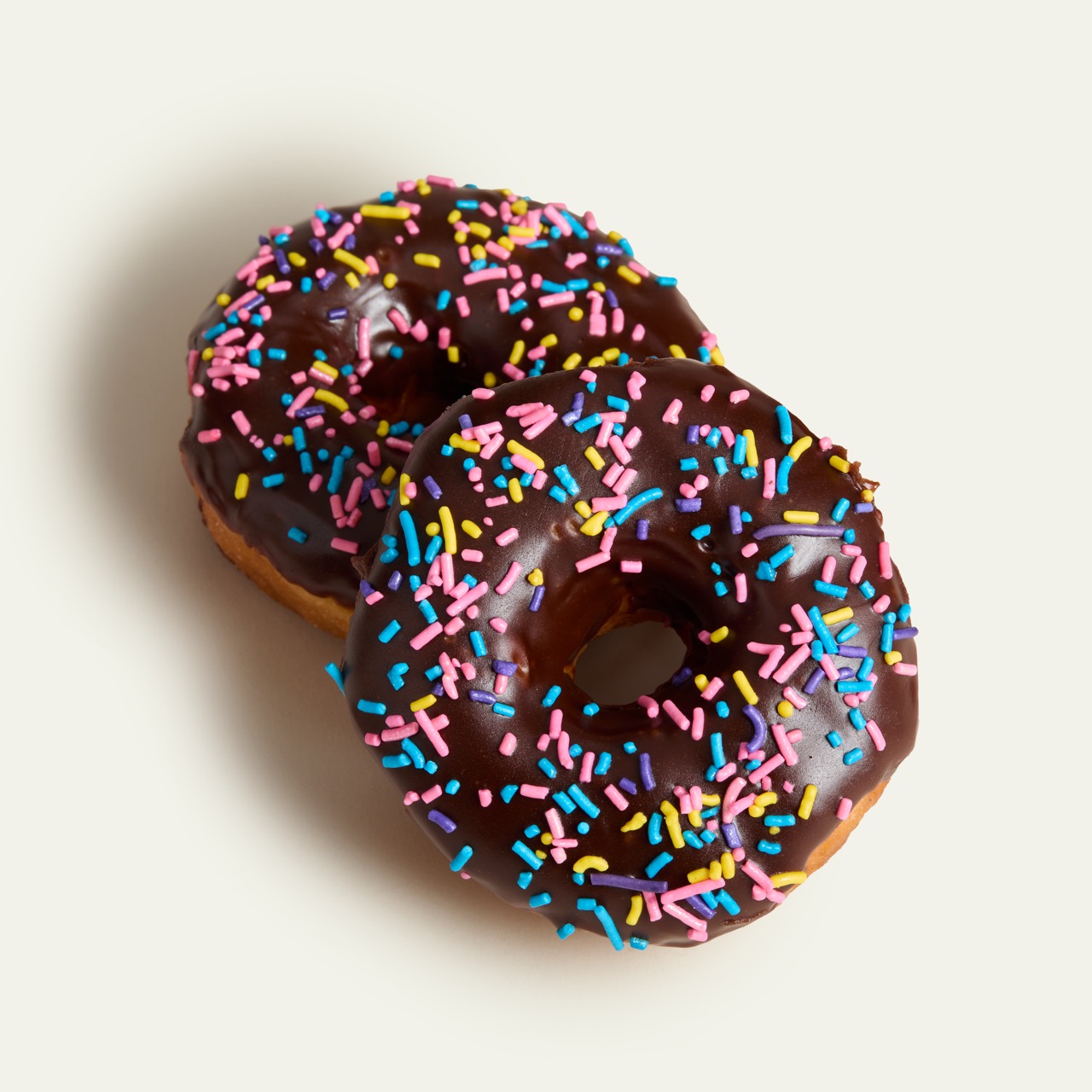 Raised Chocolate Ring Donut with Sprinkles – Coeur d’ Alene Baking Company